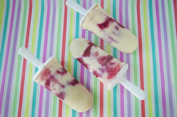 Raspberry Cheesecake Popsicles - Seasoned Sprinkles