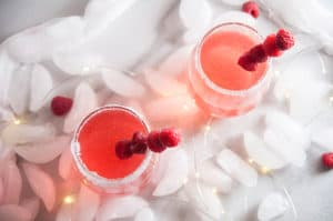 Sparkly Raspberry Champagne Cocktails - Seasoned Sprinkles