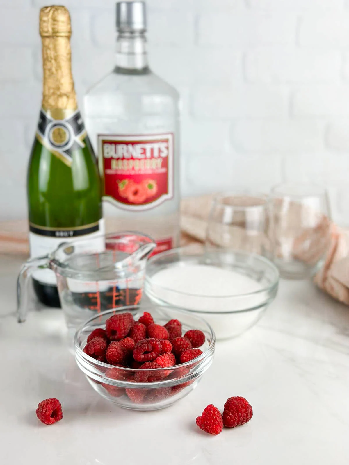 Sweet Sparkly Raspberry Champagne Cocktails - Seasoned Sprinkles