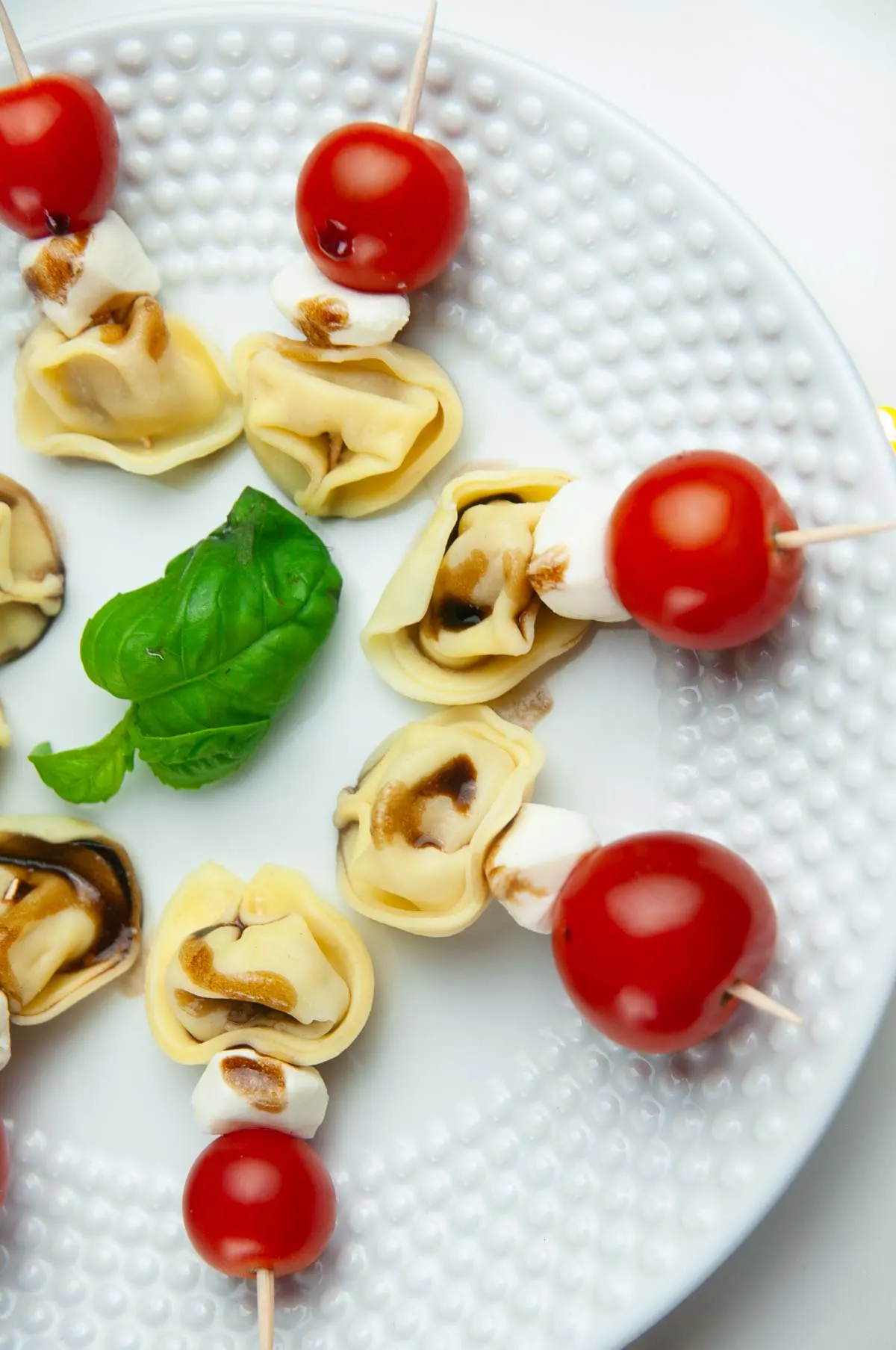 Easy Tortellini Caprese Skewers with Balsamic Glaze - Seasoned Sprinkles